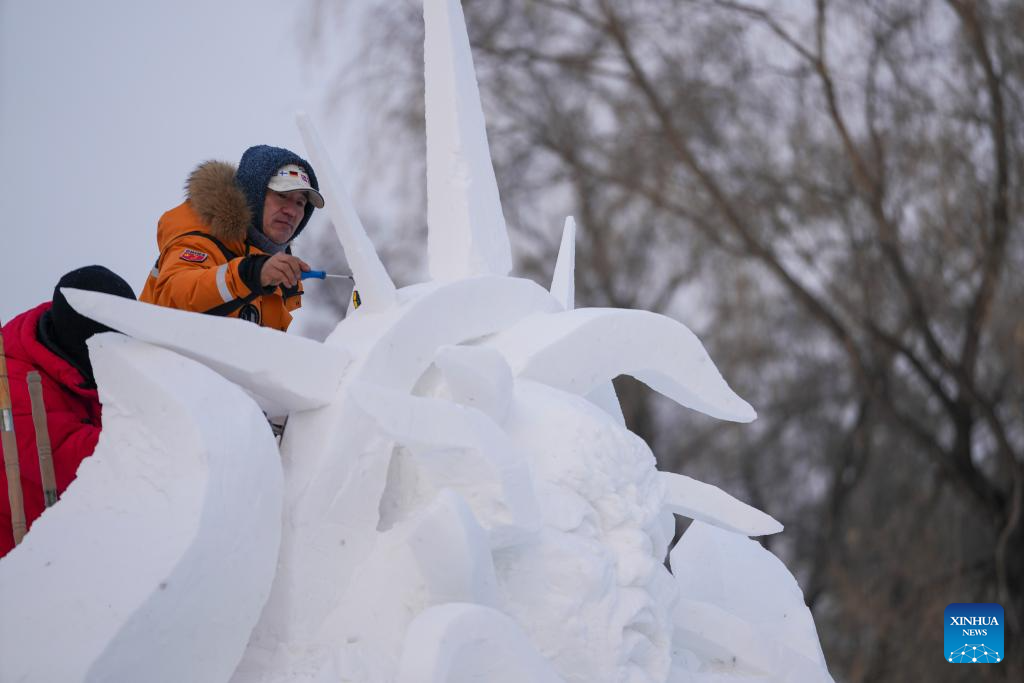 In pics: 28th Harbin international snow sculpture competition in NE ...